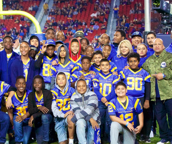 Watts Youth Football Team Goes Above and Beyond To Help Children In Un ...